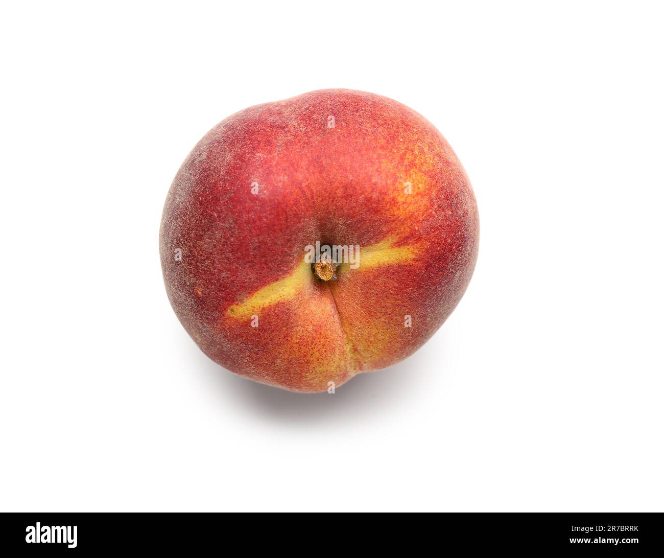 Sweet peach on white background Stock Photo - Alamy