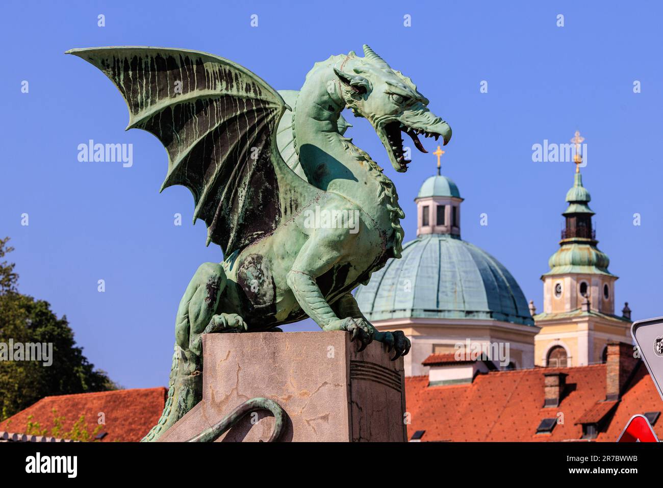 the green dragon statue on the dragon bridge of ljubljana about to ...