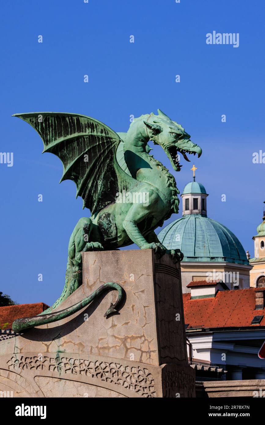 the green dragon statue on the dragon bridge of ljubljana about to ...