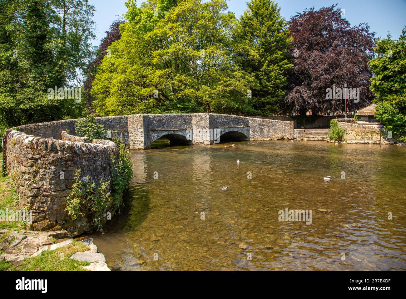Old packhorse bridge over the river Wye at Ashford-in-the-water in the ...