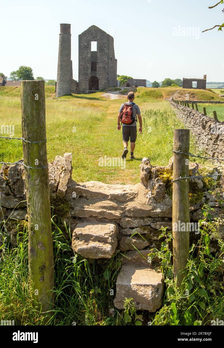 Man walking towards the Magpie Mine, the remains of a former lead mine ...