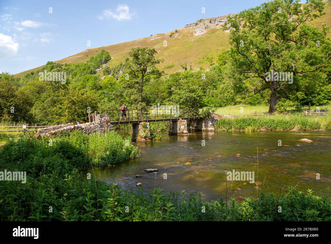 Footbridge over the river Wye in the Derbyshire Peak District beauty ...