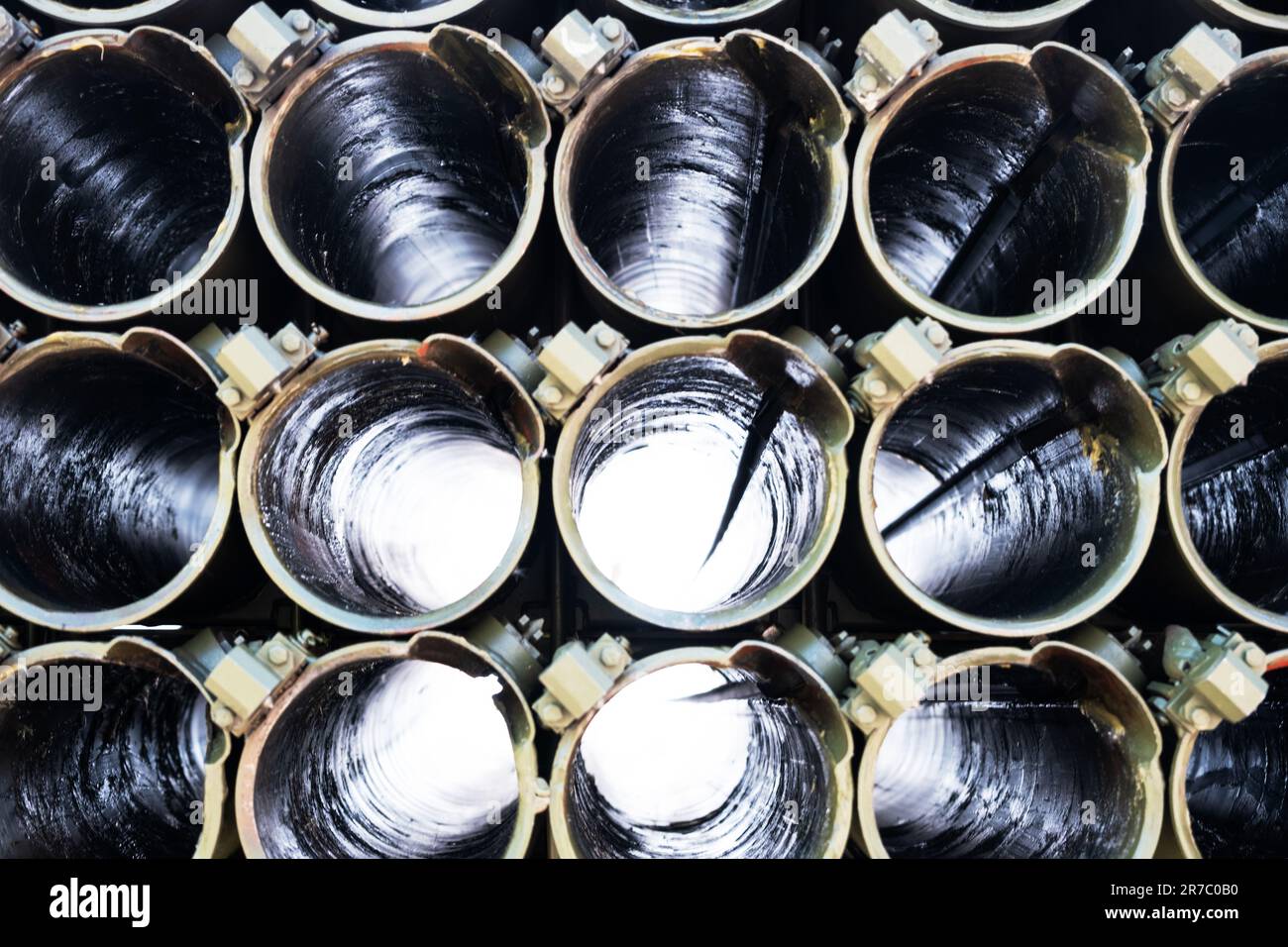 Barrels of multiple launch rocket systems, background Stock Photo - Alamy