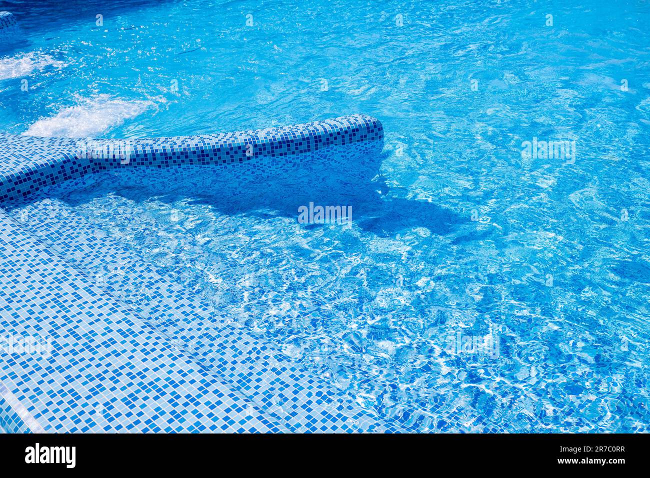 Empty Swimming pool with waterfall jet and jacuzzi in action Stock ...
