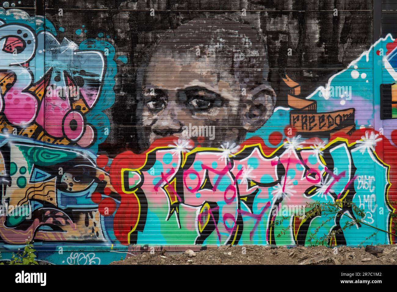 Overlapping graffitis in Kyläsaari district of Helsinki, Finland Stock ...