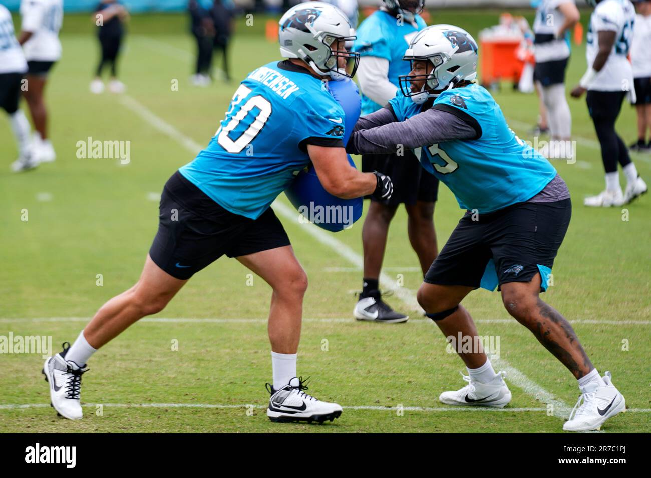 Carolina Panthers guard Michael Jordan, right, defends against ...