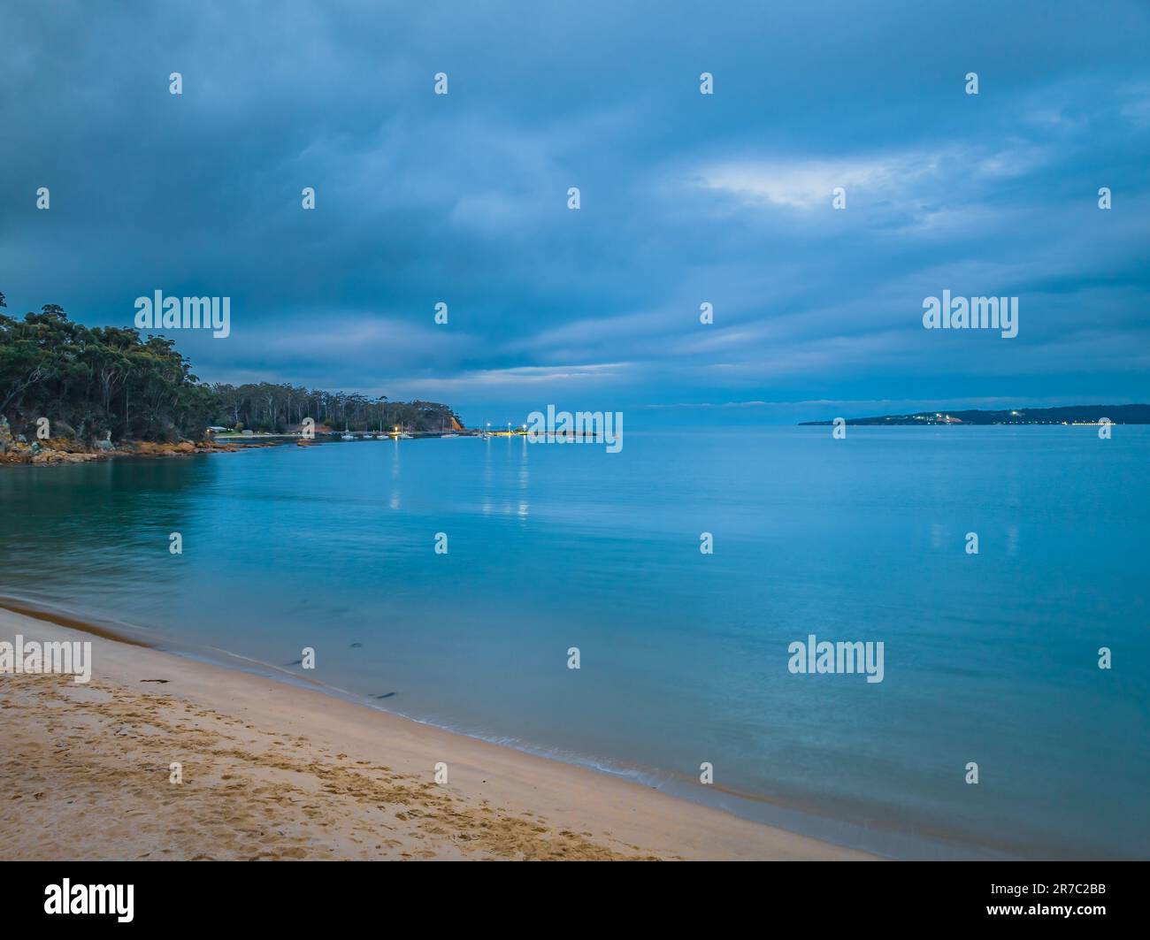 Overtones of blue sunset and twilight at Legges Beach, Twofold Bay in ...
