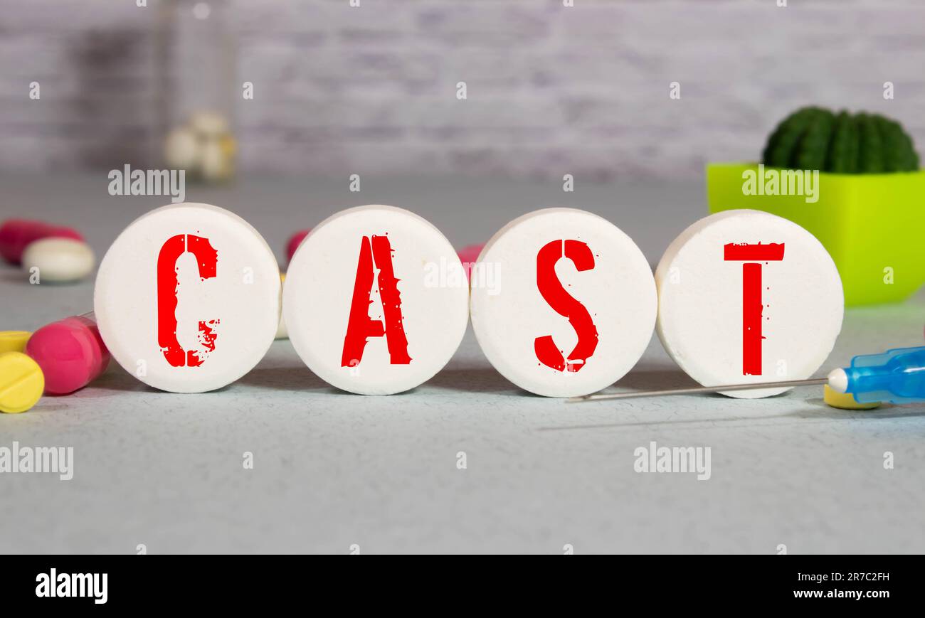 word CAST on round white tablets, medicine Stock Photo - Alamy