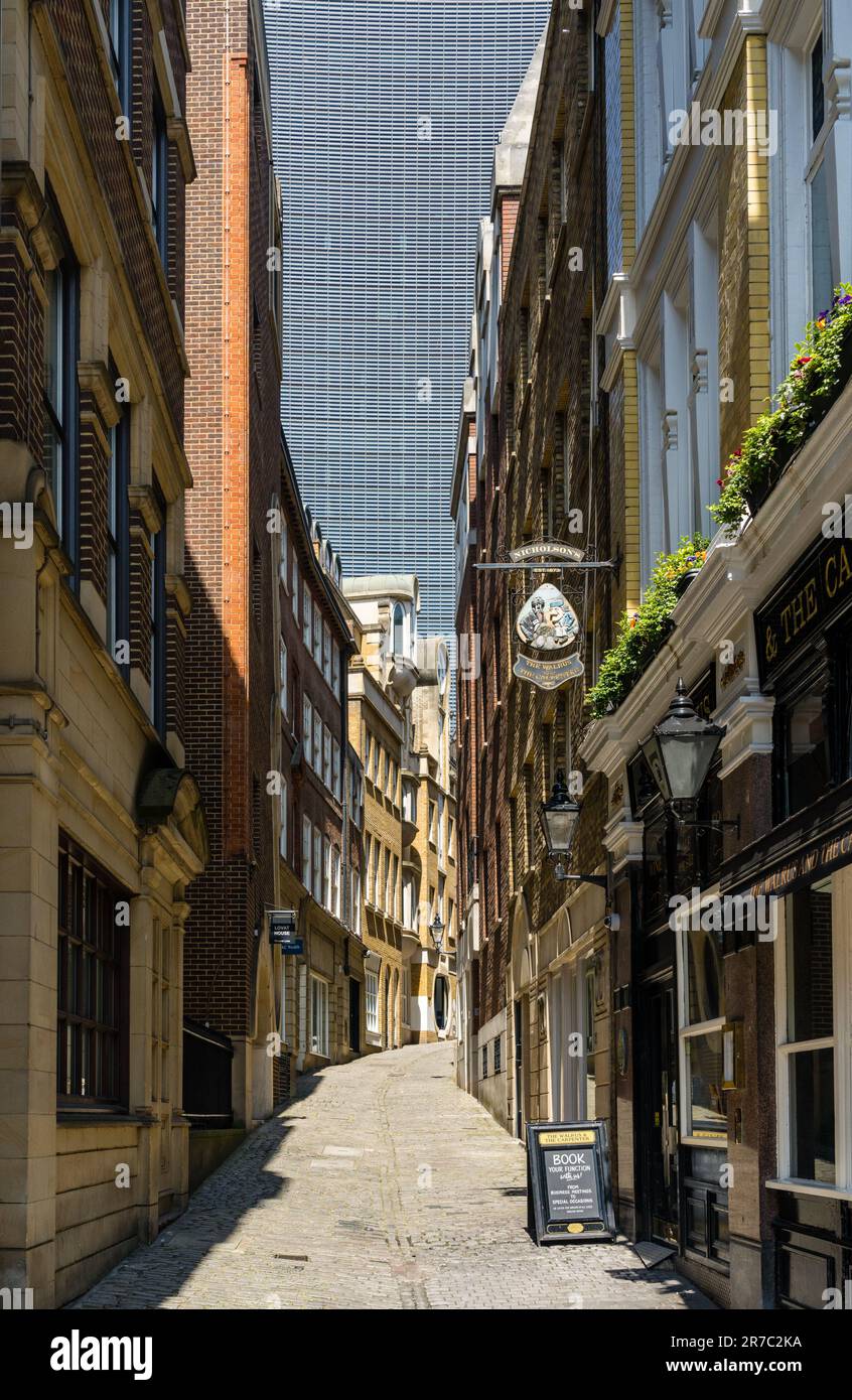 London, UK - 14 May 2023: Narrow street of Lovat Lane in City of London ...