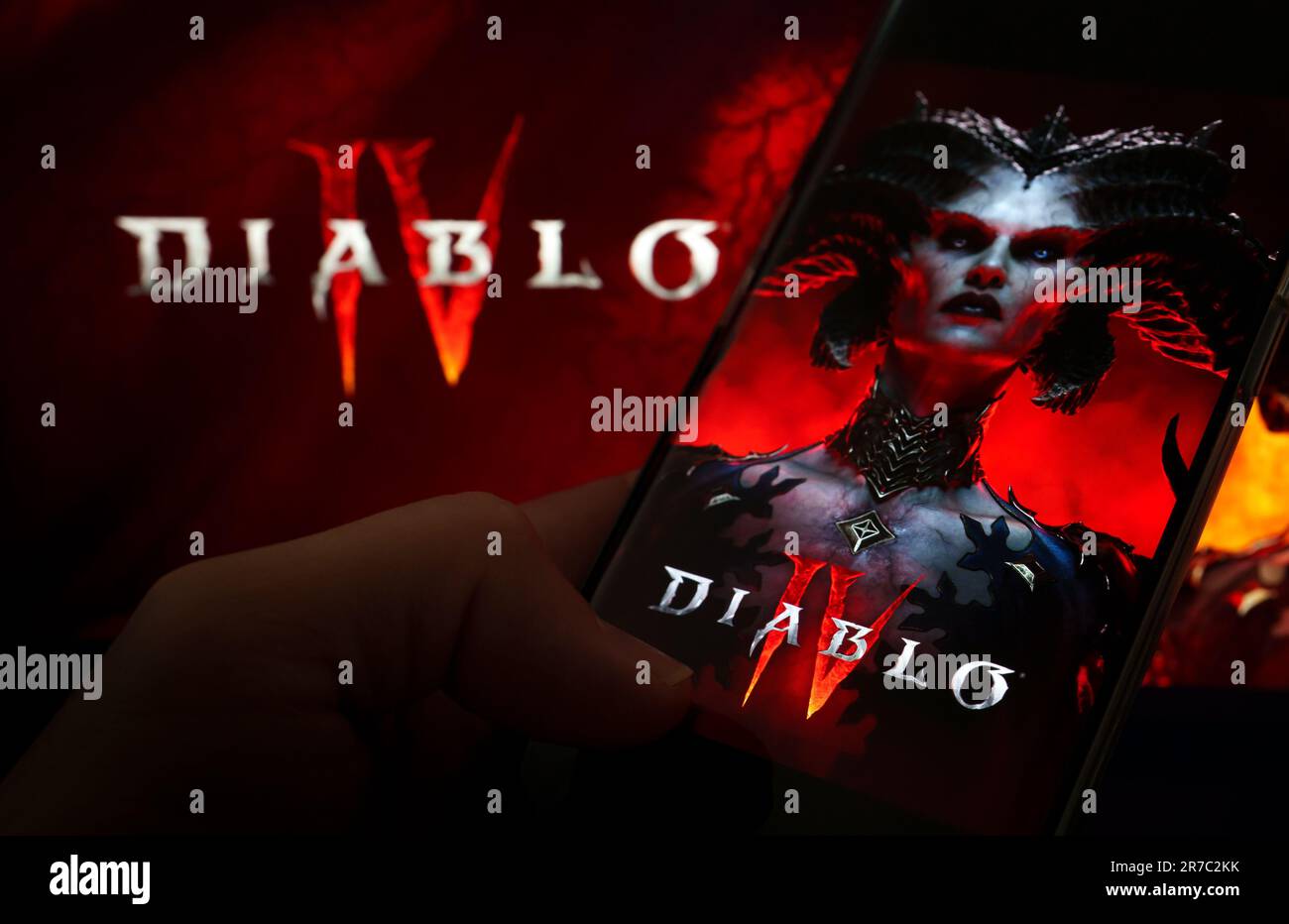 Diablo 4 game poster seen on mobile screen. Diablo IV is a game ...