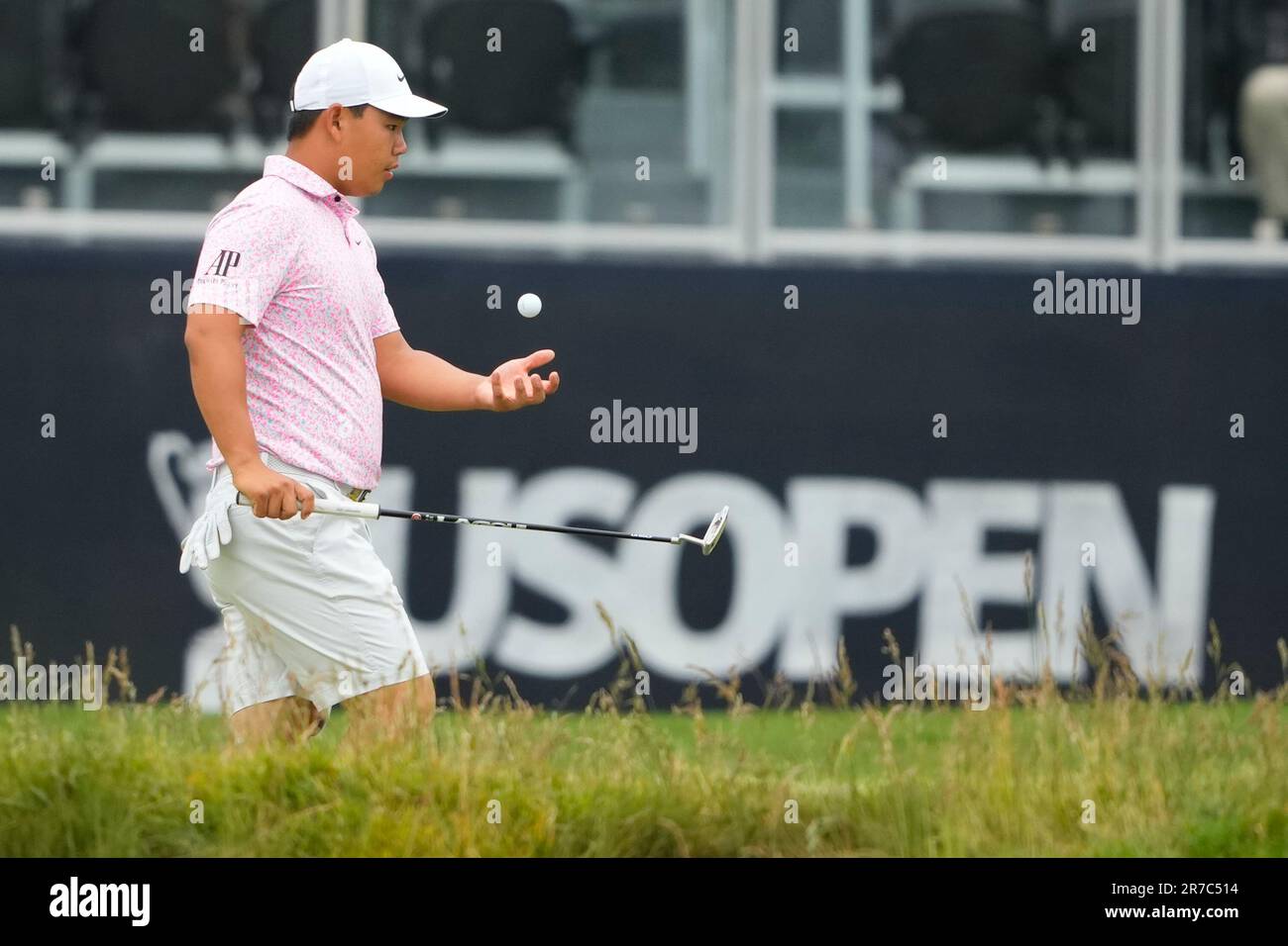 Tom Kim, of South Korea, walks on the 12th hole during a practice round for the U.S. Open ...