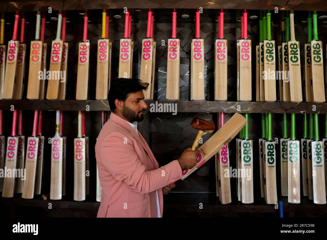 June 12, 2023, Srinagar Kashmir, India : Fawzul Kabir, the owner of a GR8 cricket bat ...