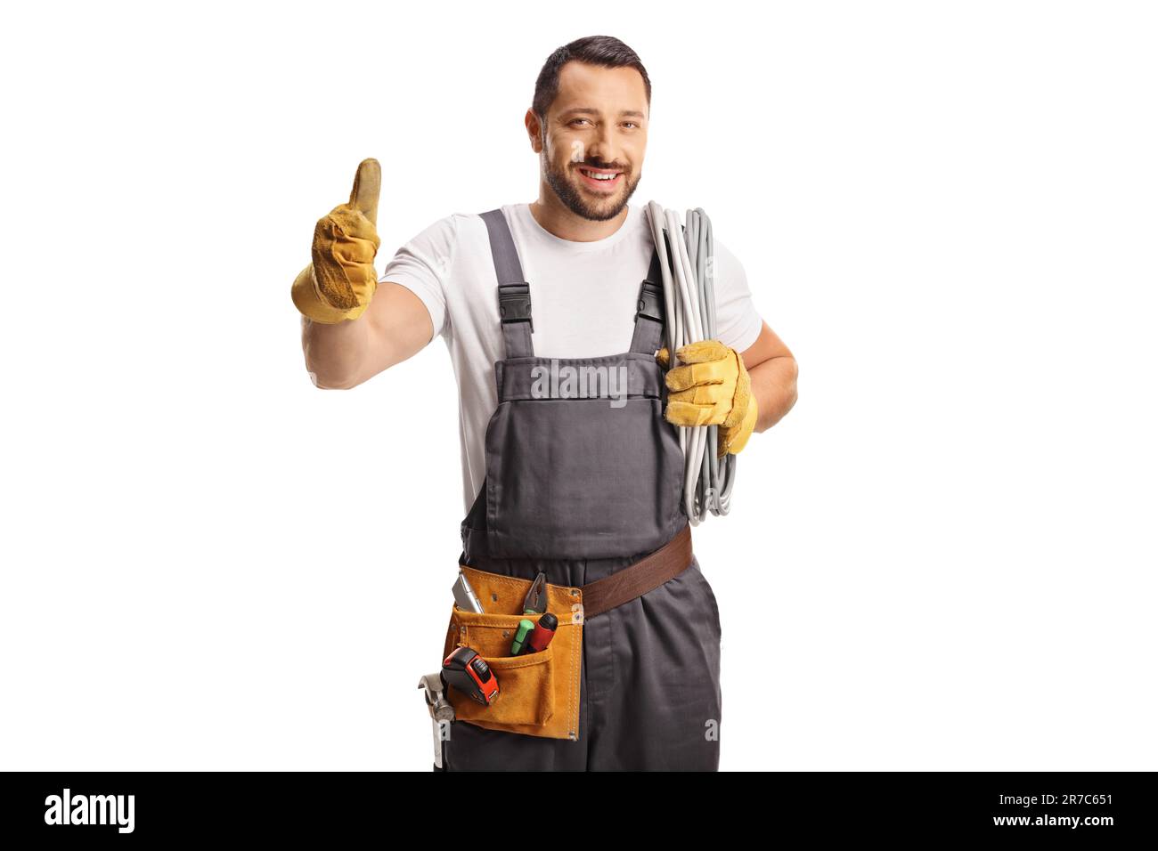 Electrician holding cable on his shoulder and gesturing thumbs up ...