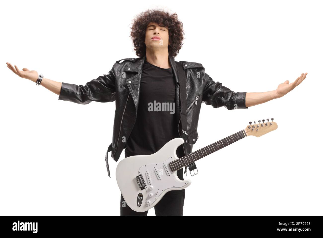 Musician in a black leather jacket with an electric guitar gesturing ...