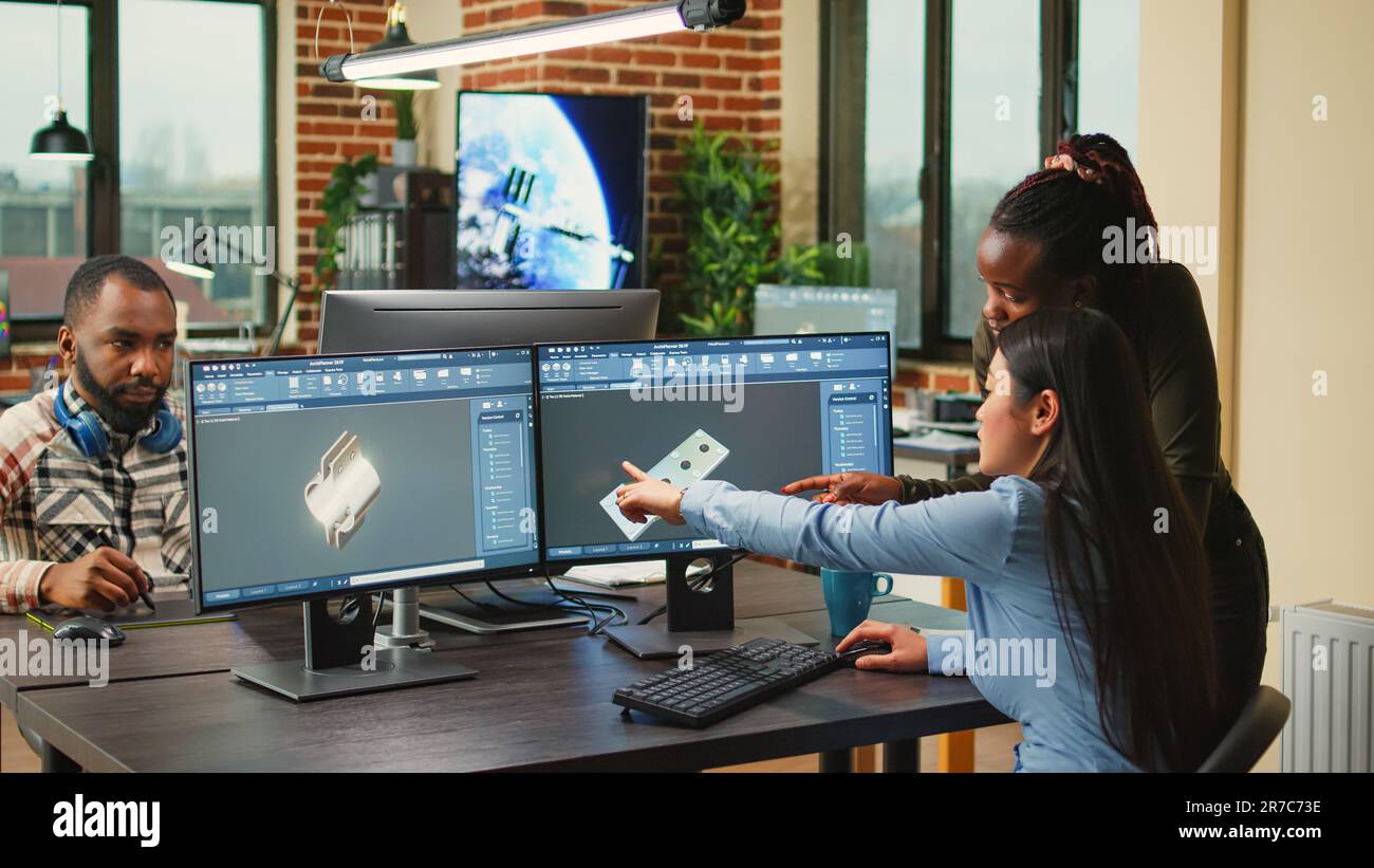 Creative agency diverse team editing video footage using color grading ...