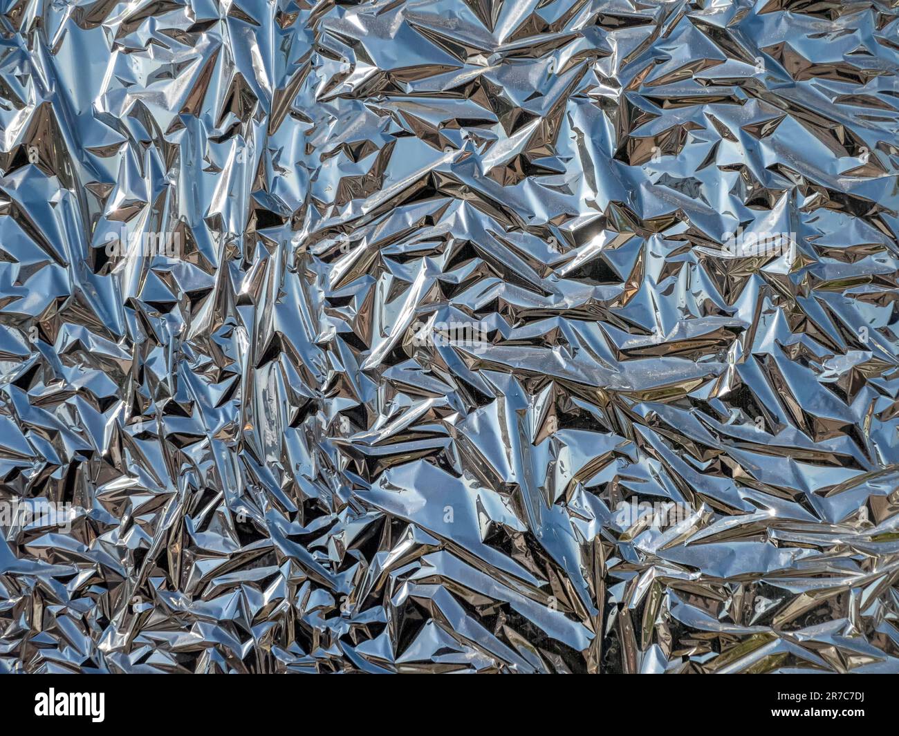 Crumpled aluminium foil, silver texture, abstract background Stock ...