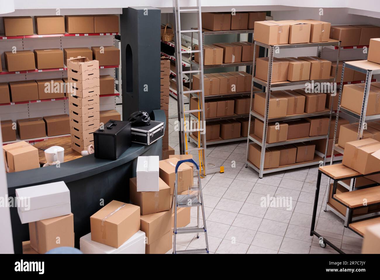 Empty huge distribution warehouse equipped with high shelves fill with ...