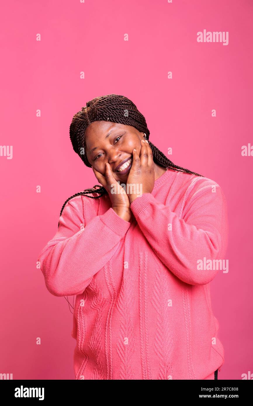 African american woman posing with overjoyed happy facial expressions ...