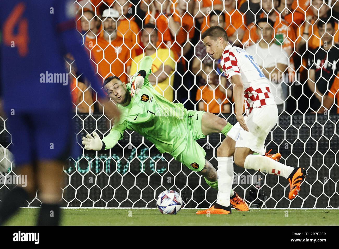 ROTTERDAM - 14/06/2023, ROTTERDAM - (LR) Holland goalkeeper Justin Bijlow, Mario Pasalic of ...