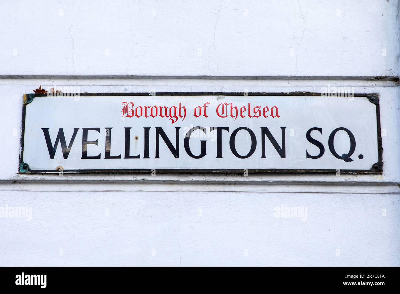 A street sign for Wellington Square in the Chelsea area of London, UK ...