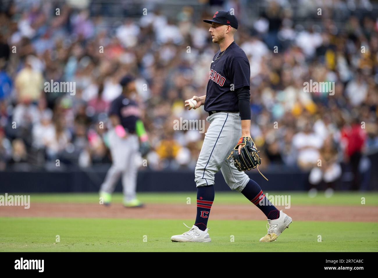 Cleveland Guardians starting pitcher Tanner Bibee walks back towards ...
