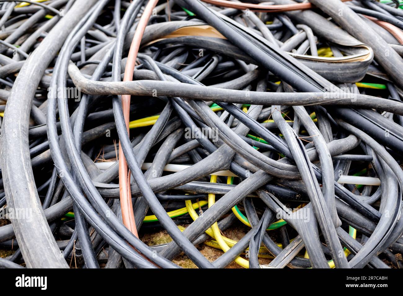 Outer casings of pvc electrical cables, abandoned and discarded, ready ...