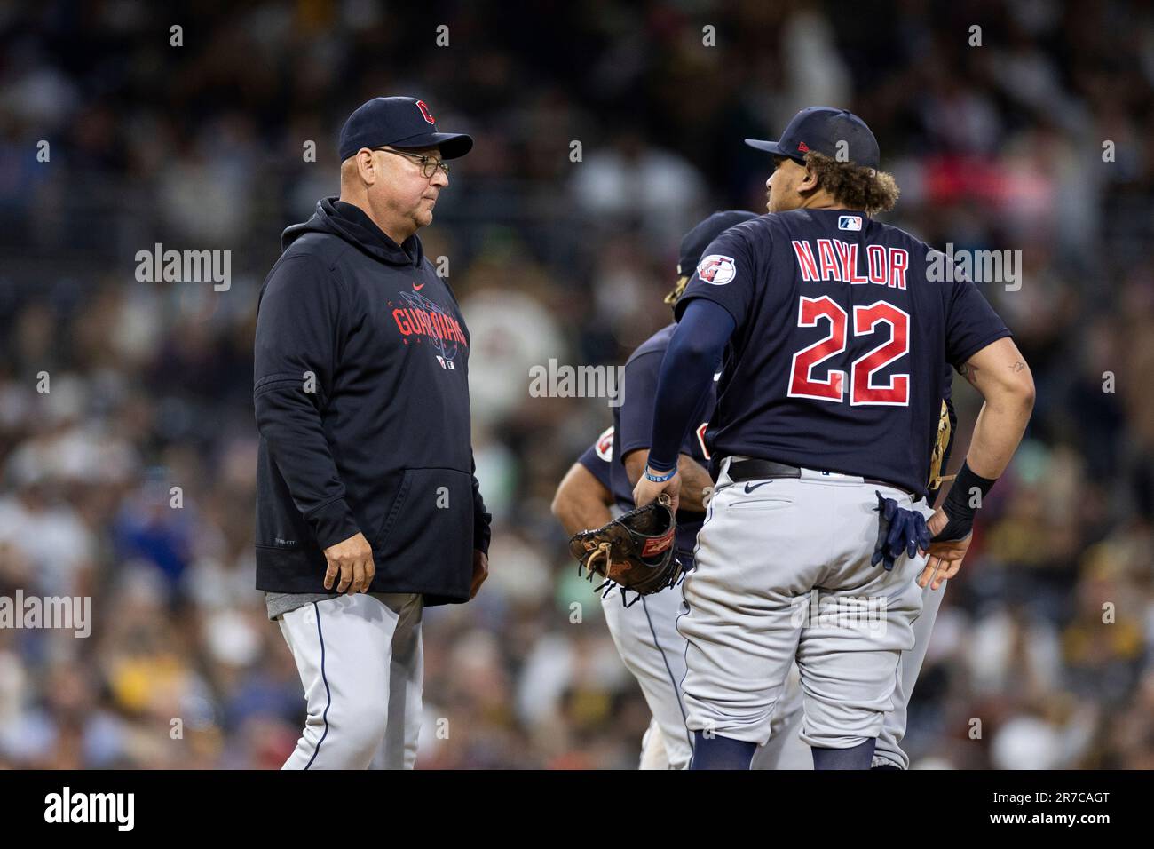 Cleveland Guardians manager Terry Francona, left, visits Josh Naylor ...