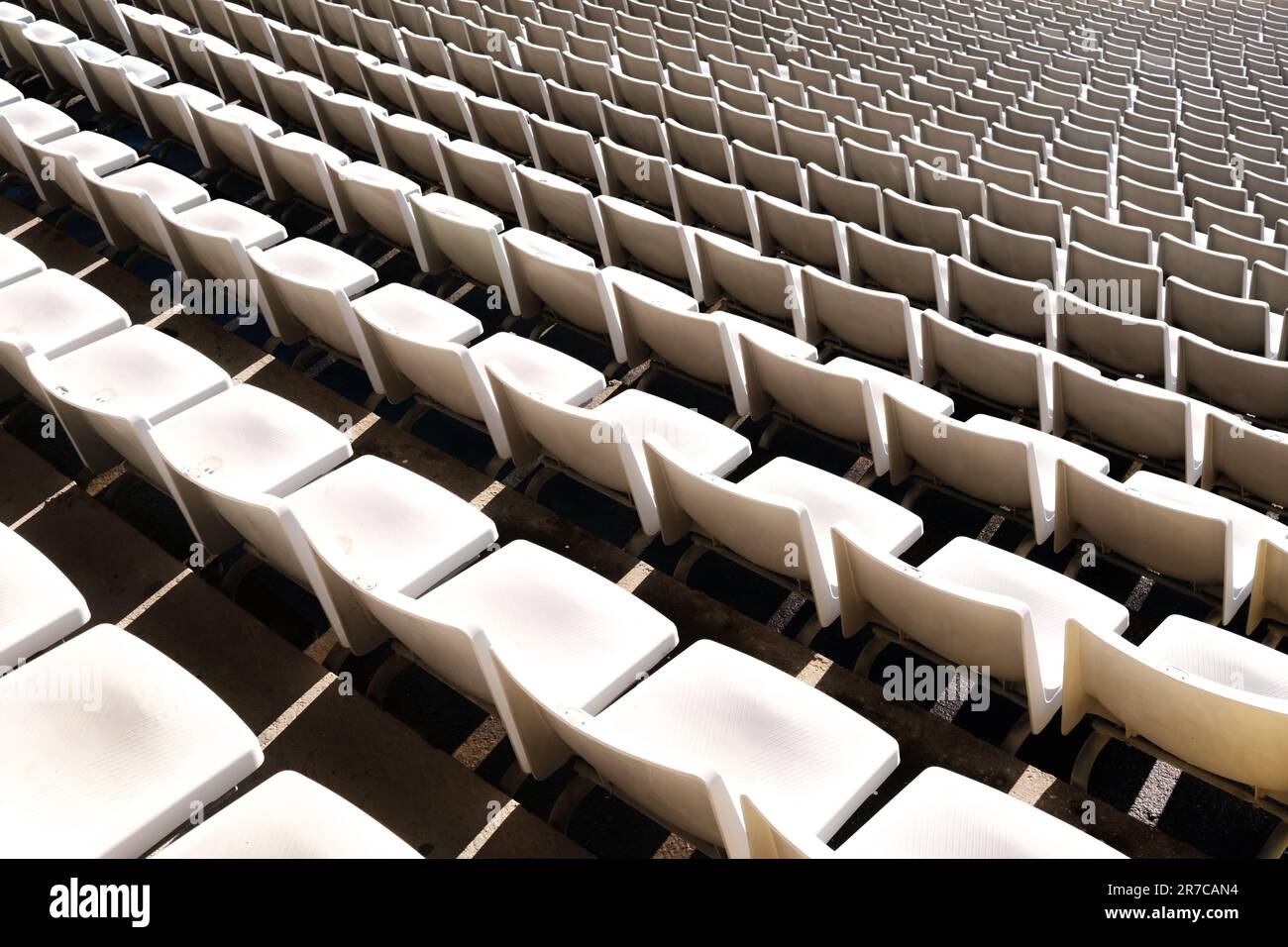 Rows of empty seats in a sports stadium Stock Photo - Alamy