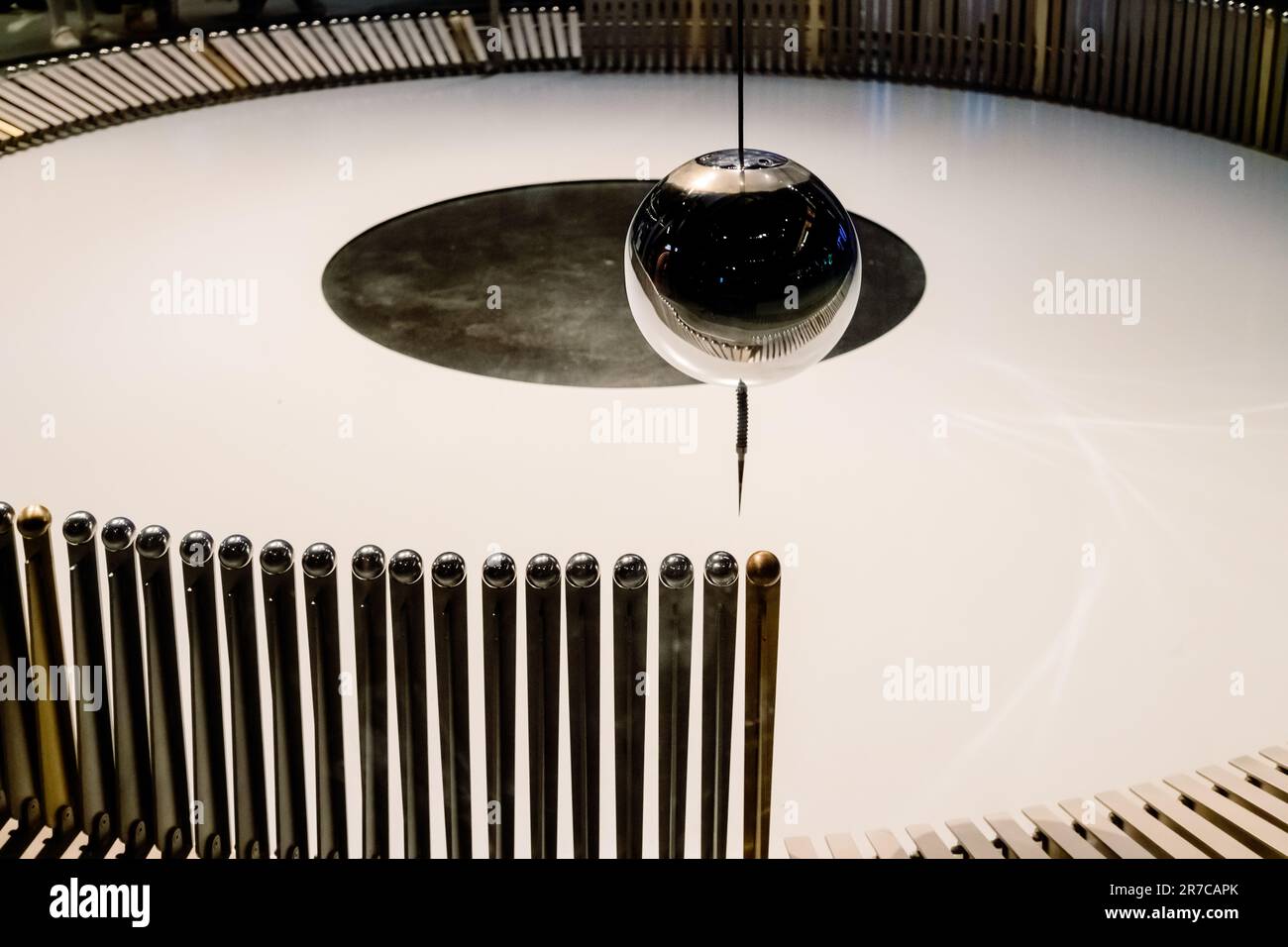Swinging ball of the Eddy pendulum in a science demonstration Stock ...