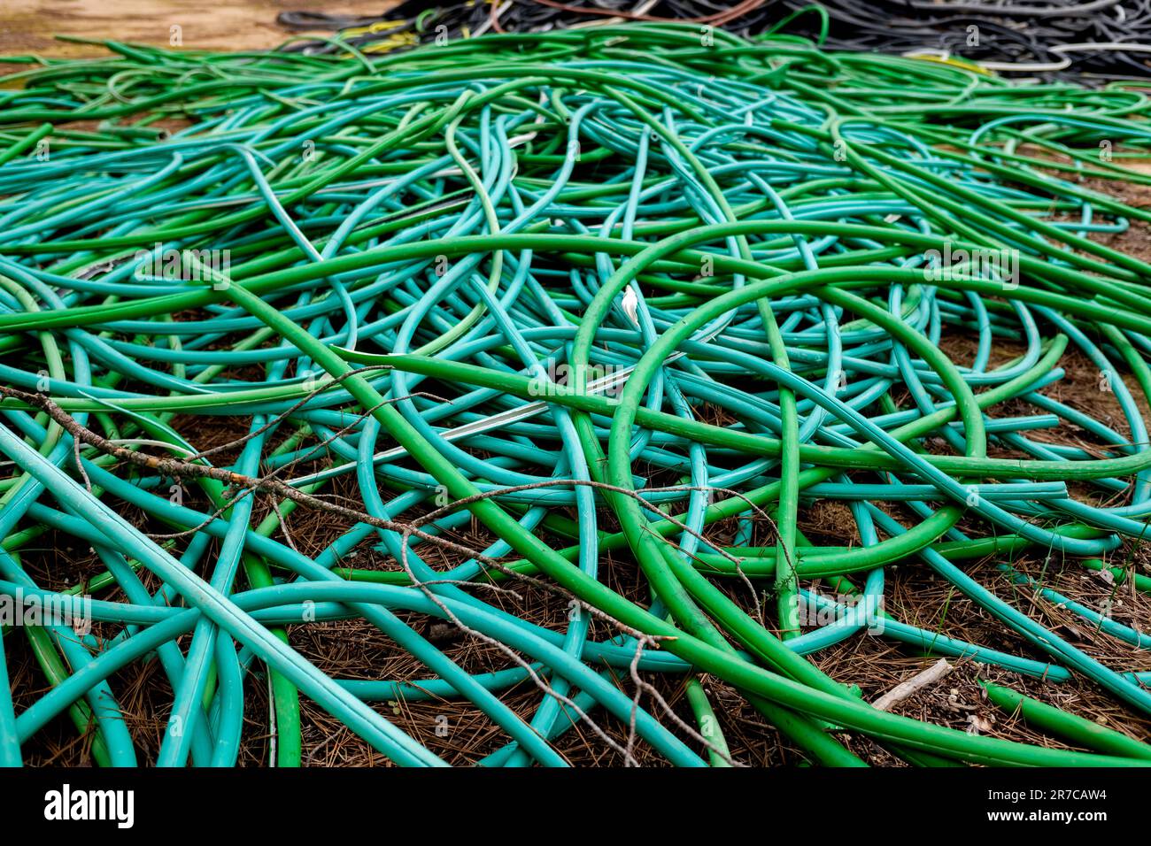 Outer casings of pvc electrical cables, abandoned and discarded, ready ...