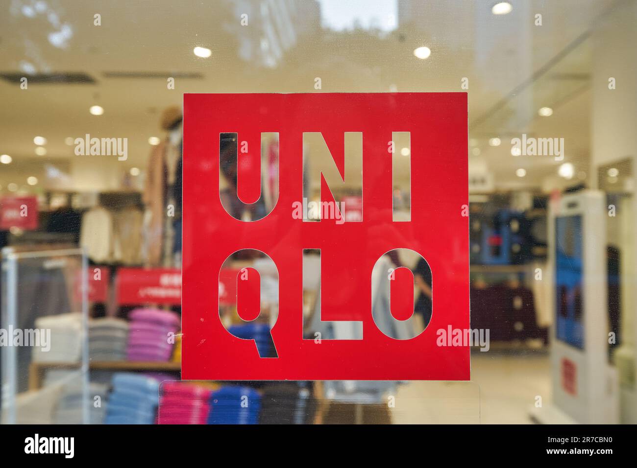 SHENZHEN, CHINA - 27 NOVEMBER, 2019: close up shot of Uniqlo sign seen ...