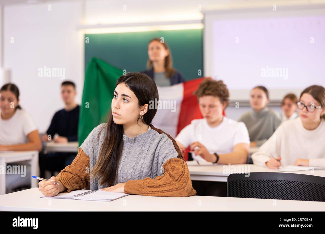 Young girl student diligently studies at school Stock Photo - Alamy