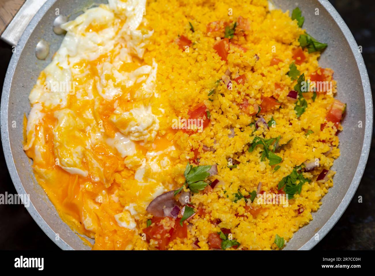 Traditional couscous with egg, typical Brazilian food. Rustic corn ...