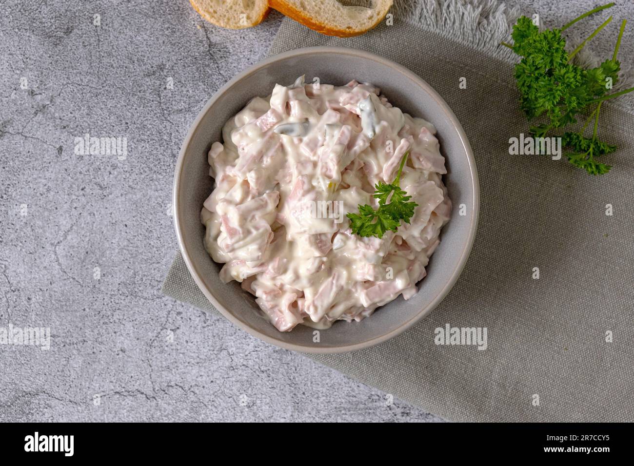 Traditional German meat salad with pickled cucumbers. Top view Stock ...