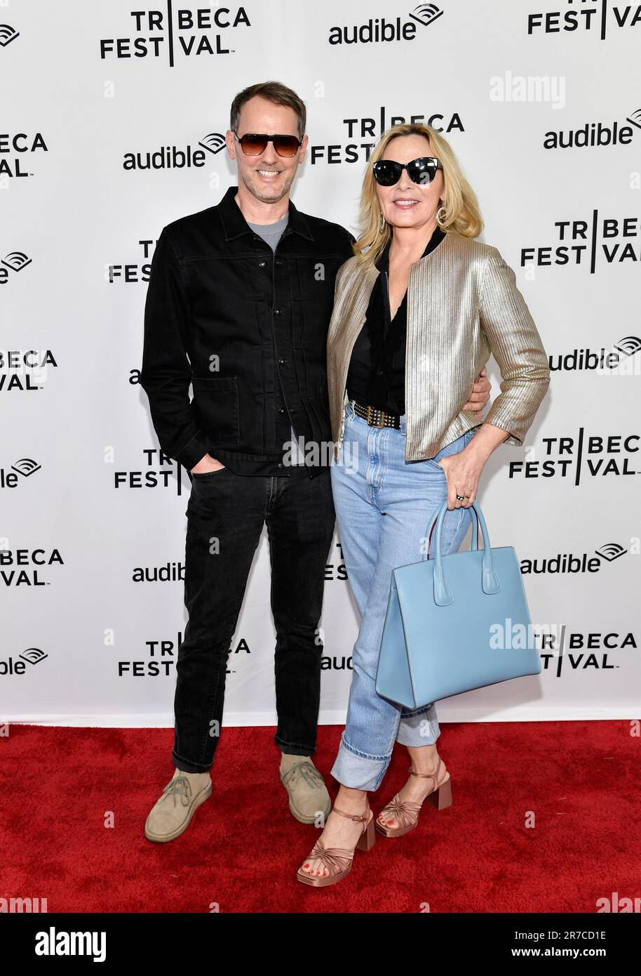 Kim Cattrall, right, and boyfriend Russell Thomas arrive at the Modern ...