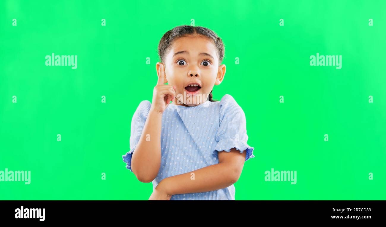 Face, green screen and child in studio with idea, answer or solution ...