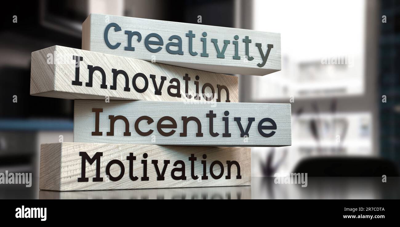 Creativity, innovation, incentive, motivation - words on wooden blocks ...