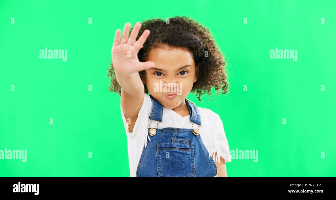 Angry child, stop and hand on green screen background with emoji and ...