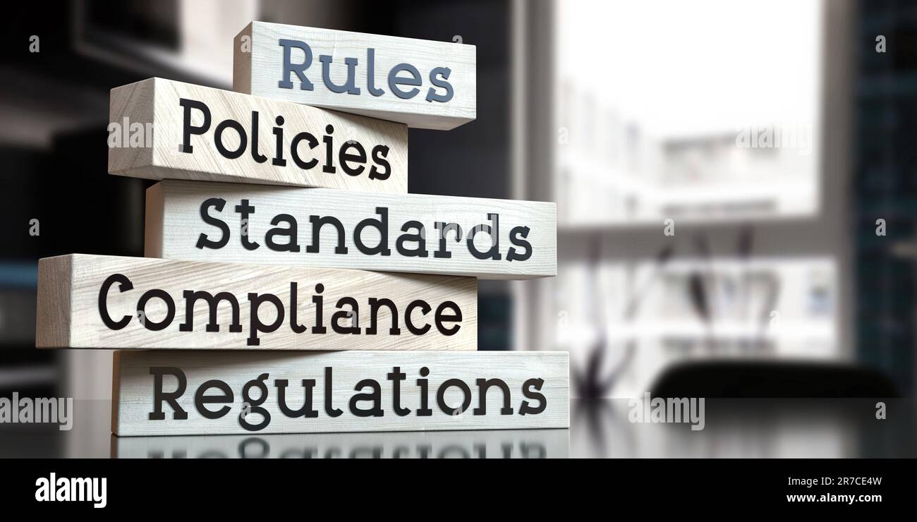 Rules, policies, standards, compliance, regulations - words on wooden ...