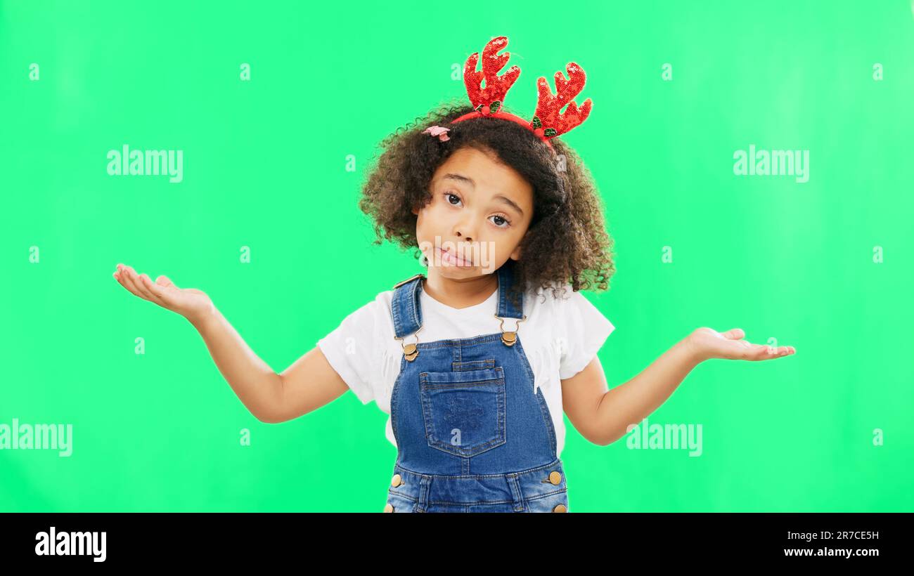 Shrug, green screen and face of a child with a gesture isolated on a ...