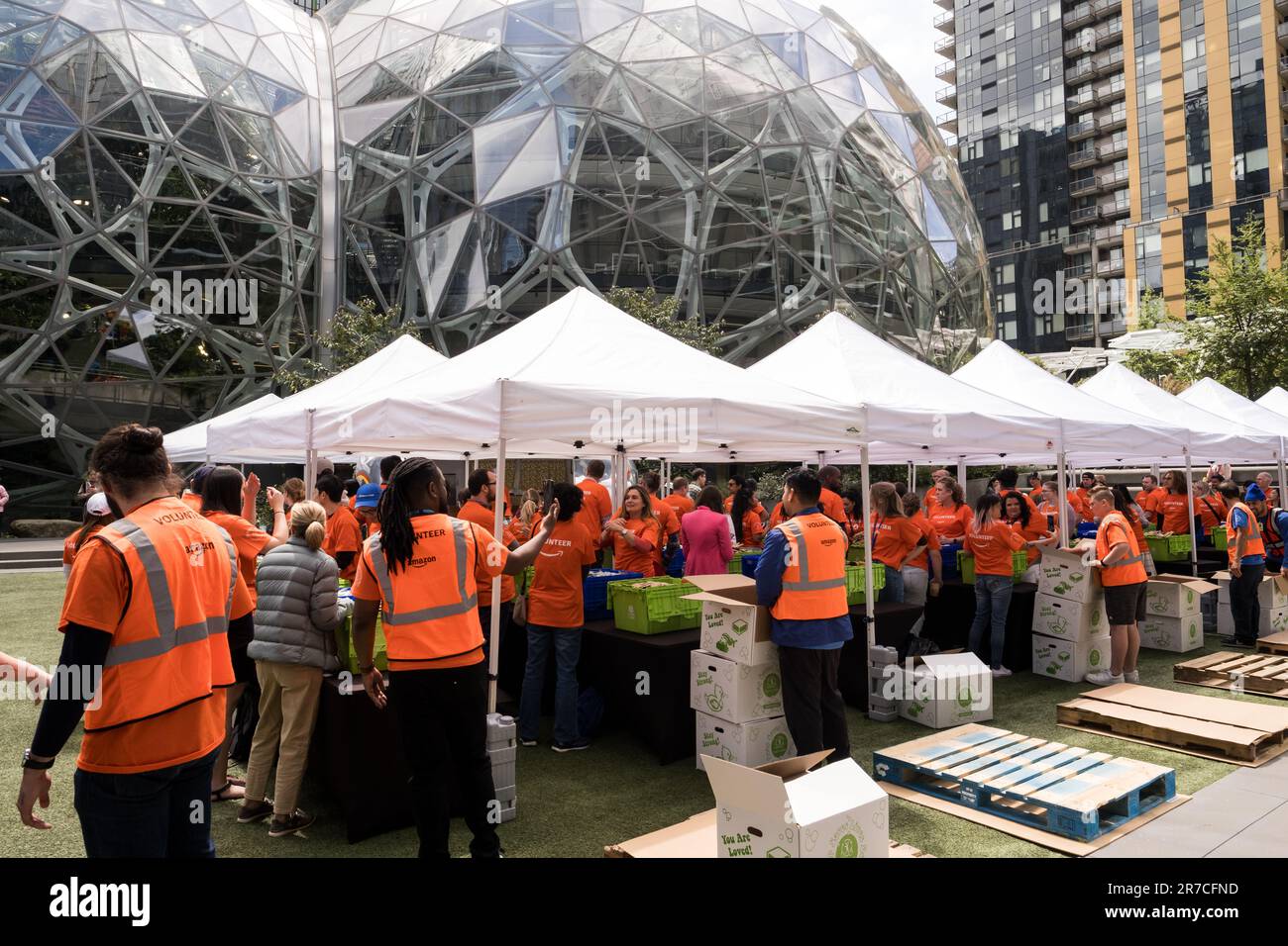 Seattle, USA. 14 Jun, 2023. Volunteers fill Amazon corporate outside ...