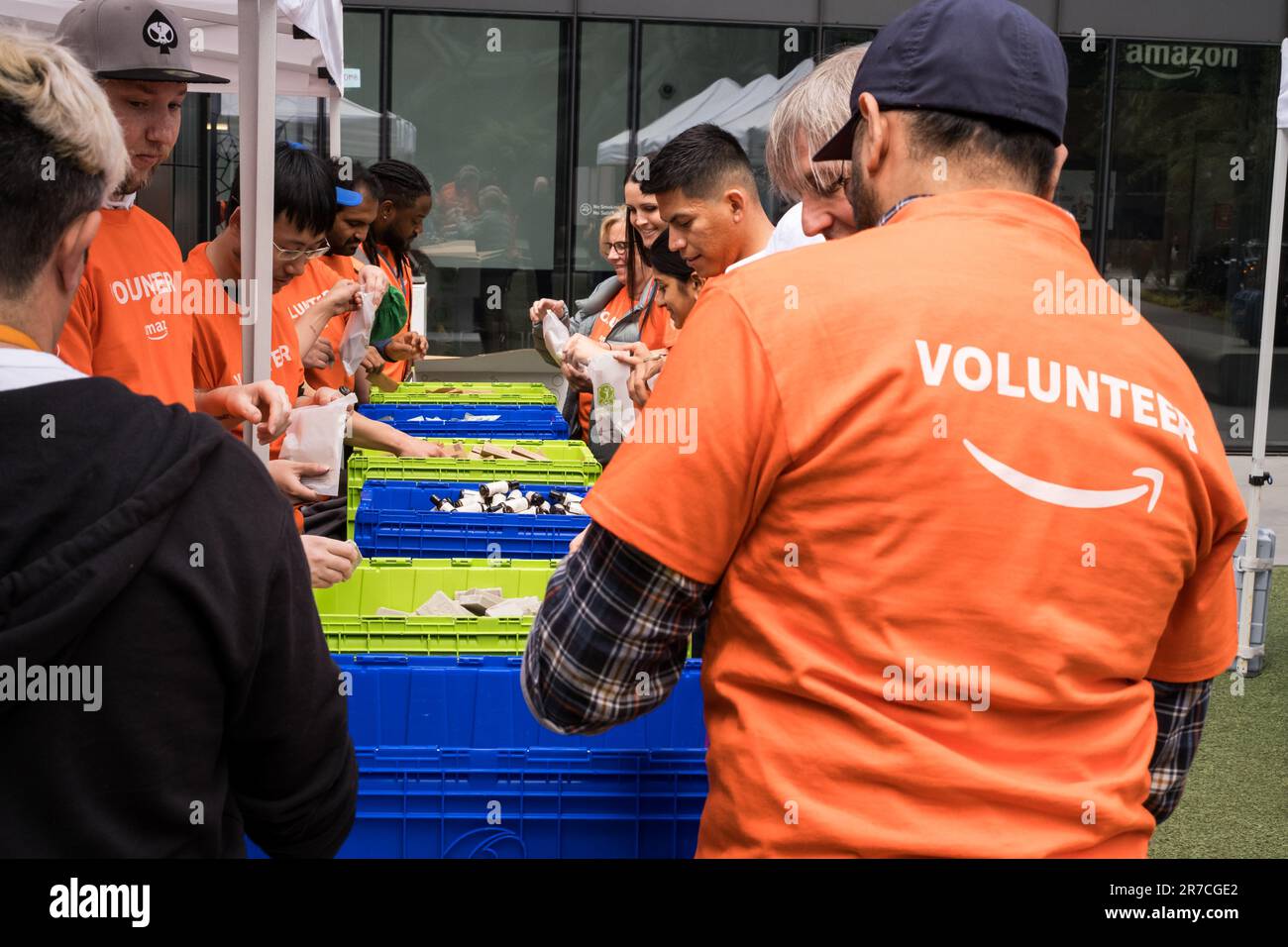 Seattle, USA. 14 Jun, 2023. Volunteers fill Amazon corporate outside ...