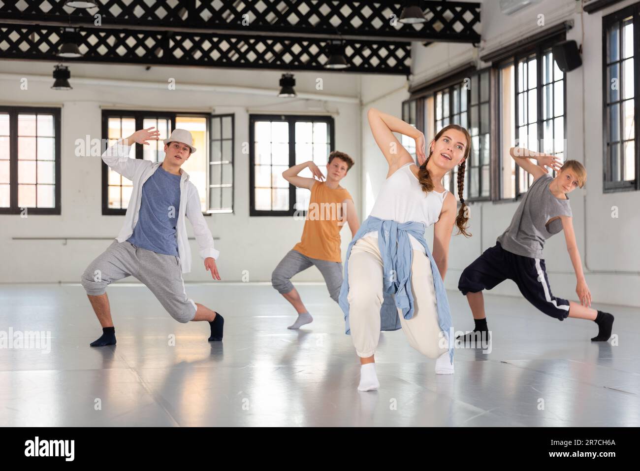 Group of young artists performing street dance Stock Photo - Alamy