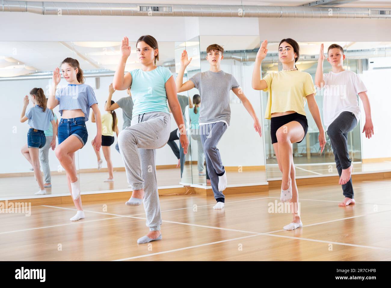 Teenage dancers practicing new dance in studio Stock Photo - Alamy