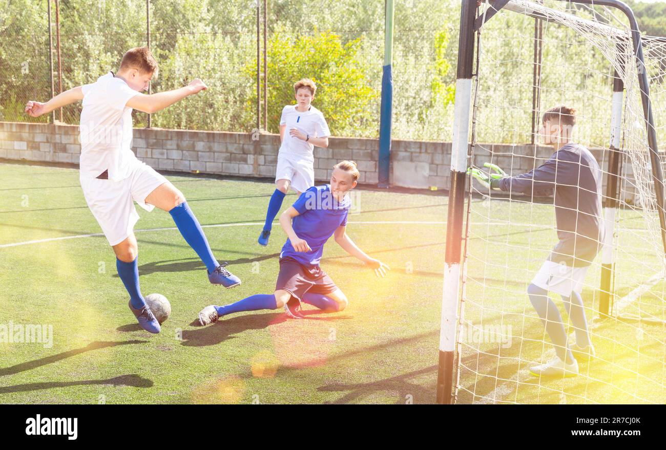 Football game - sharp moments in scoring area Stock Photo - Alamy