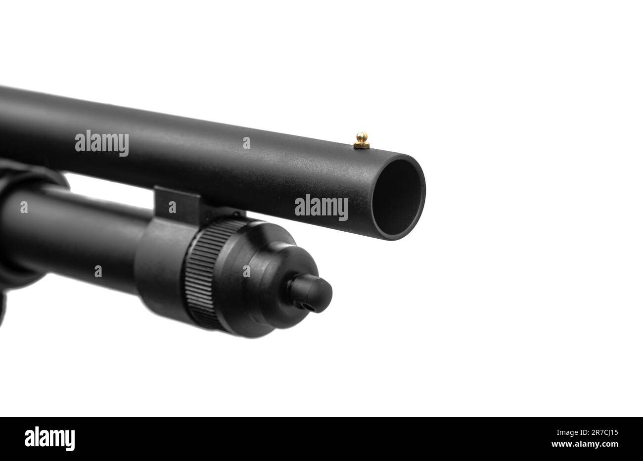 Pump-action 12 gauge shotgun isolated on a white background. Close-up ...