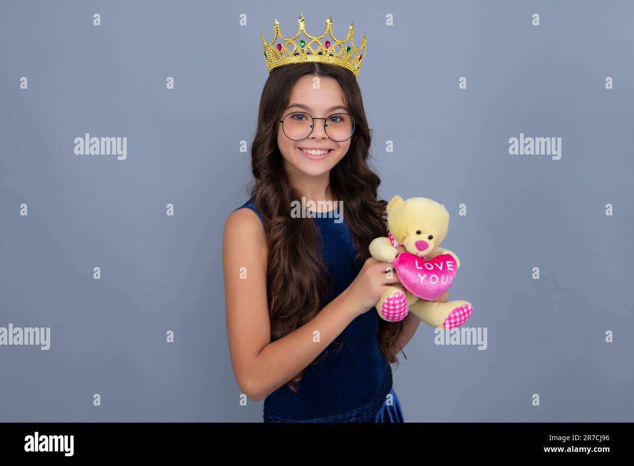 Birthday kids prom party. Little queen wearing golden crown. Teenage ...