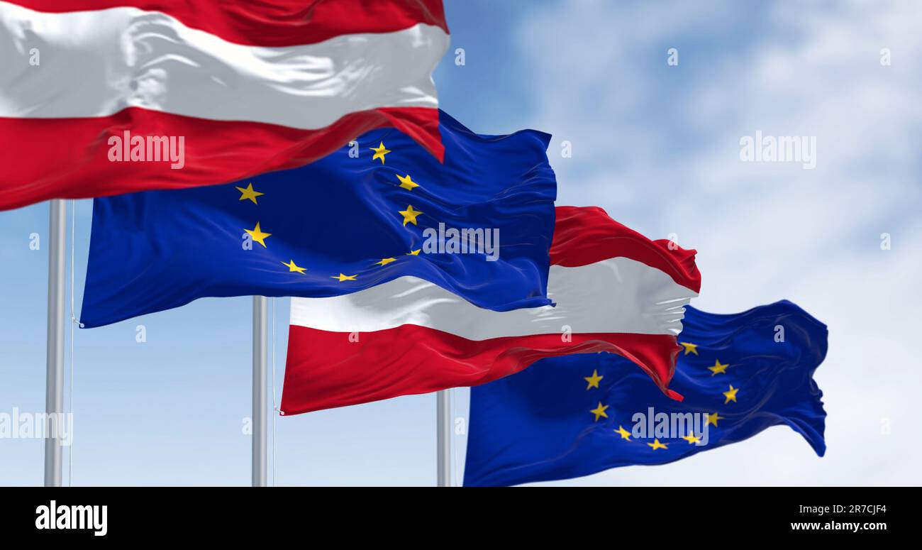 Austria and European Union flags waving together on a clear day ...