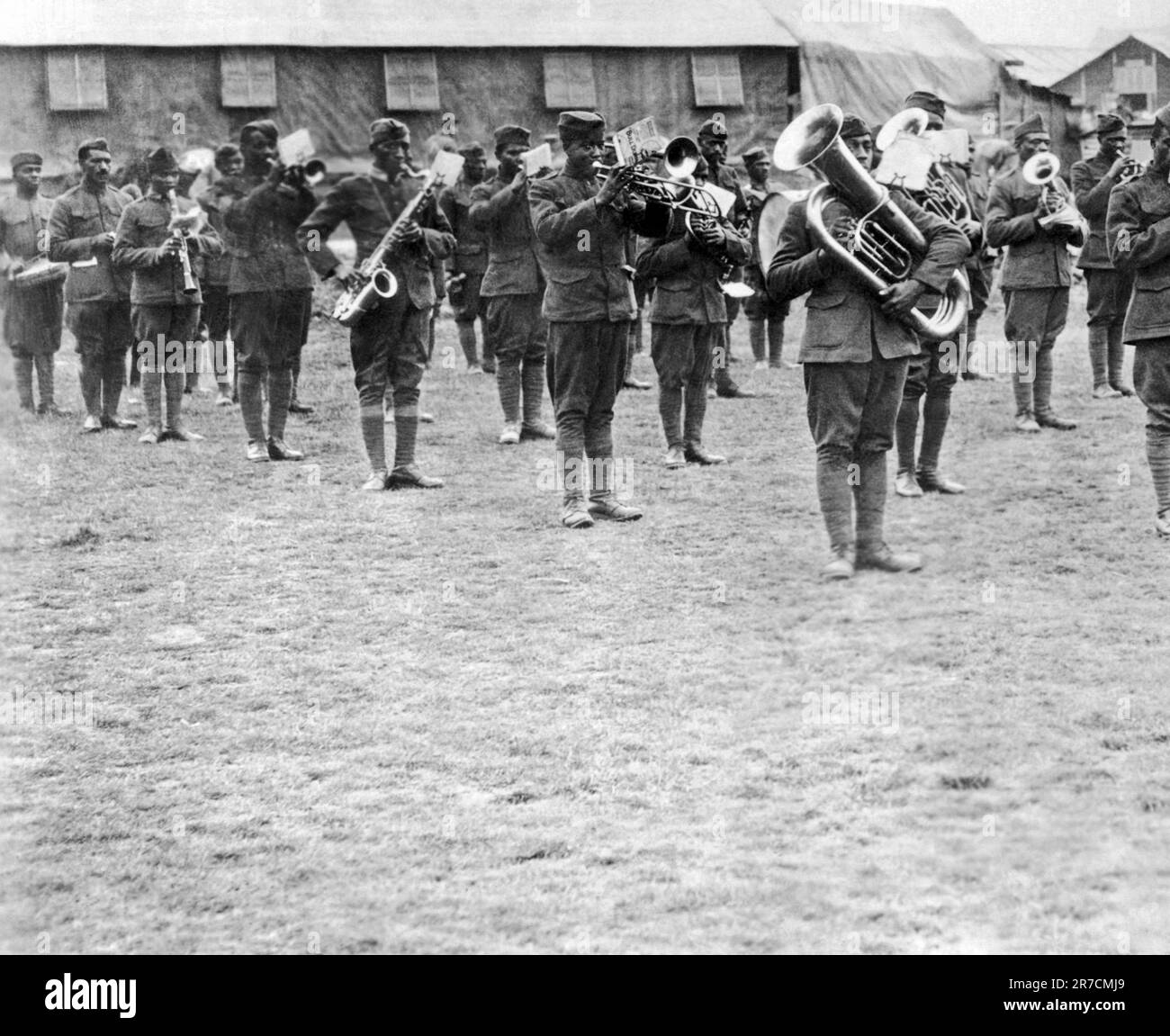 France: c. 1918. Members of the 369th Infantry Regiment band under the ...