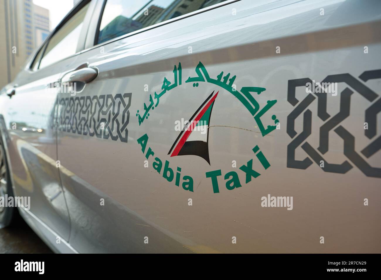 ABU DHABI, UAE - CIRCA JANUARY, 2020: close up shot of Arabia Taxi sign ...
